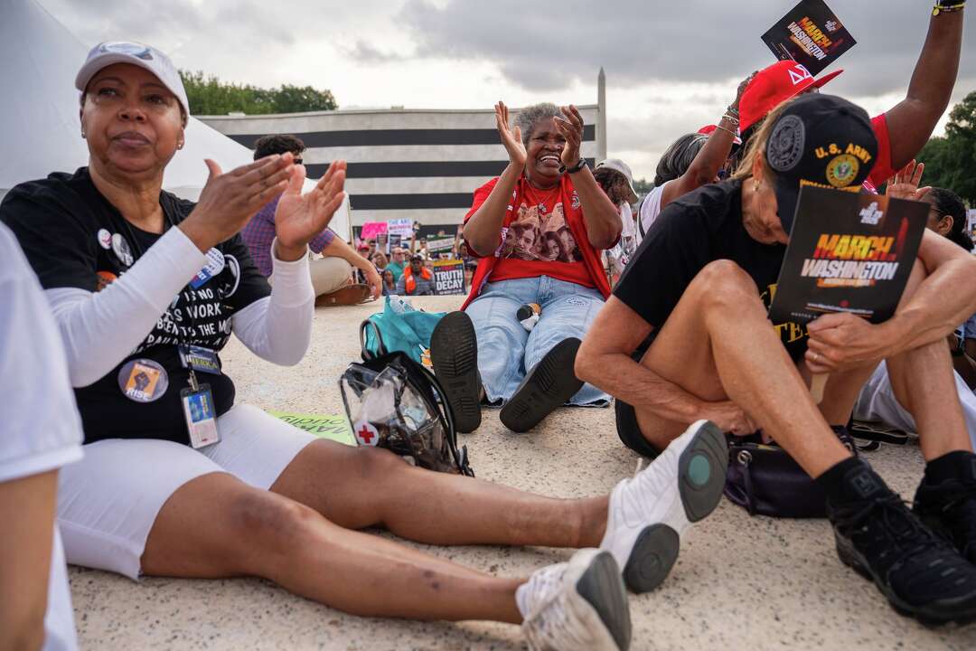 Thousands march in Washington to defend voting rights, in photos