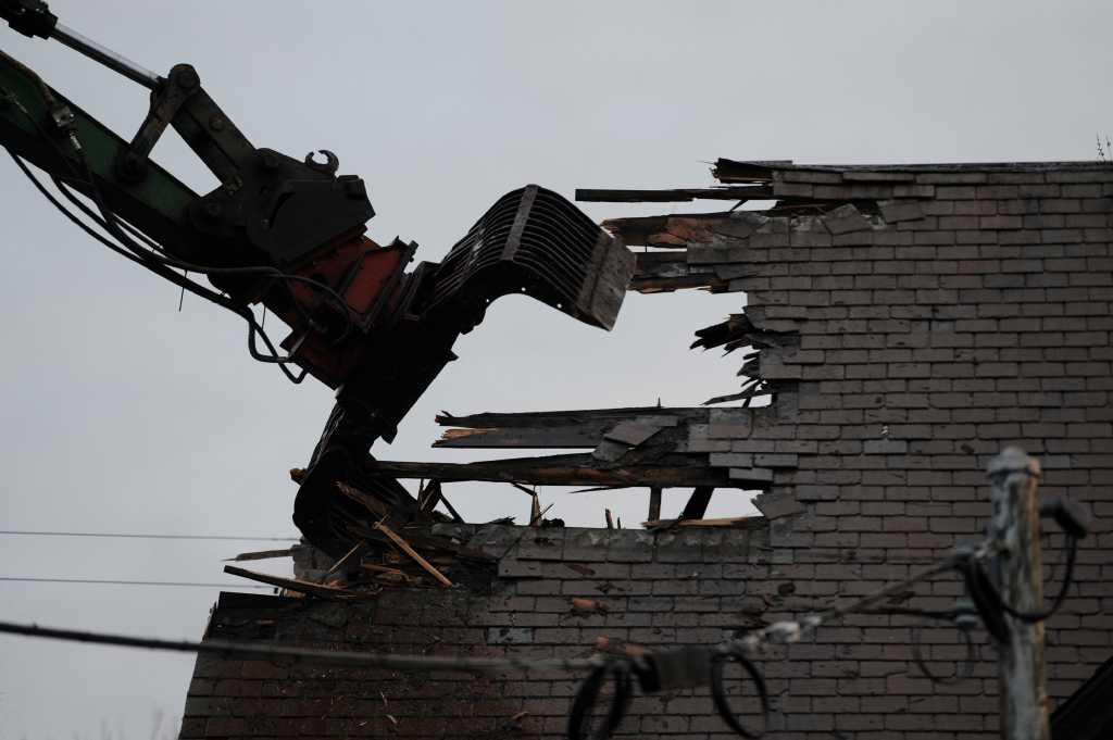 Fire demolition reveals body