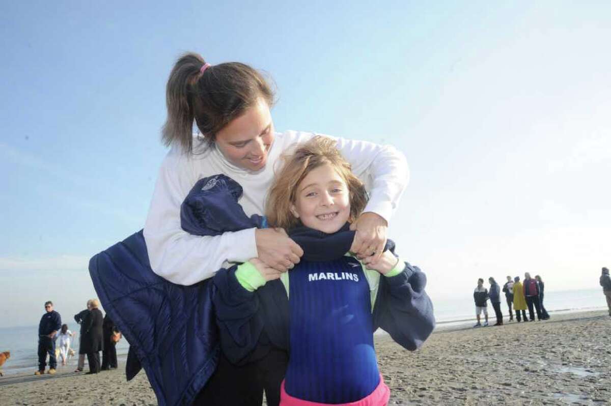 Hundreds brave polar plunge