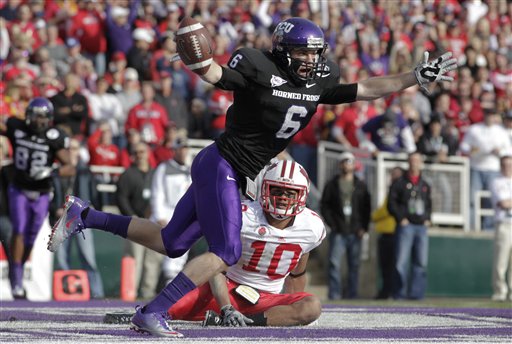 TCU holds off Wisconsin to cap perfect season
