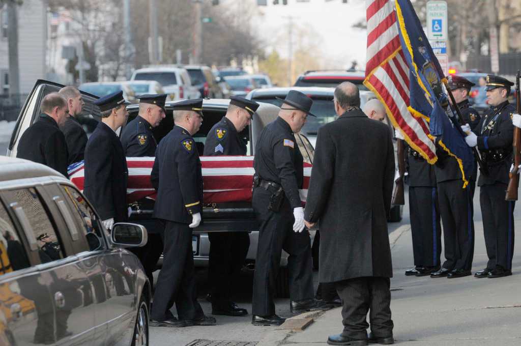 In photos: Police salute a fallen officer
