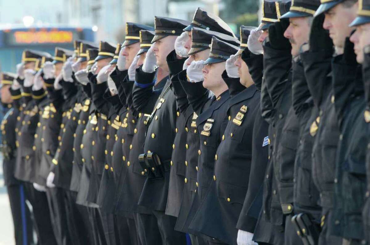 In photos: Police salute a fallen officer