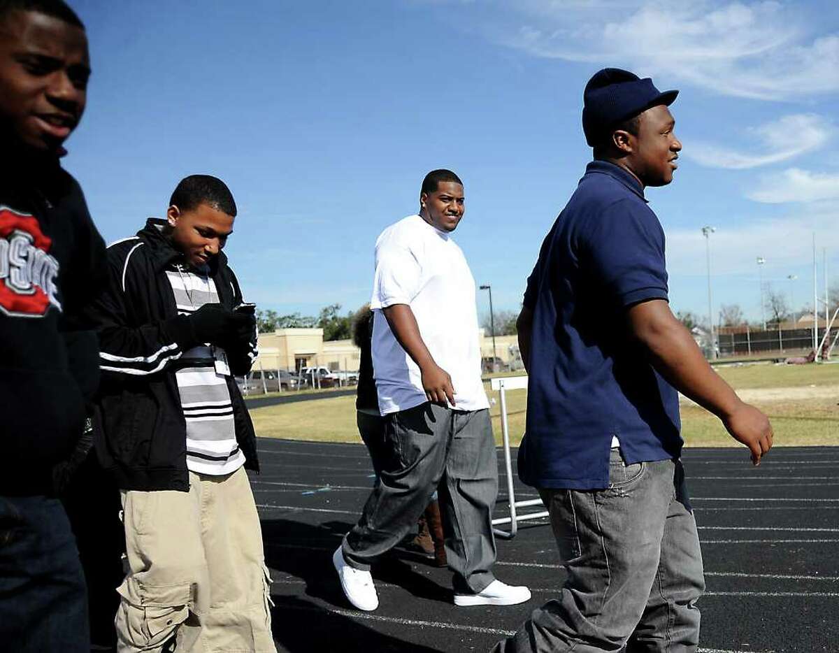NFL player Anthony Collins returns to visit former high school