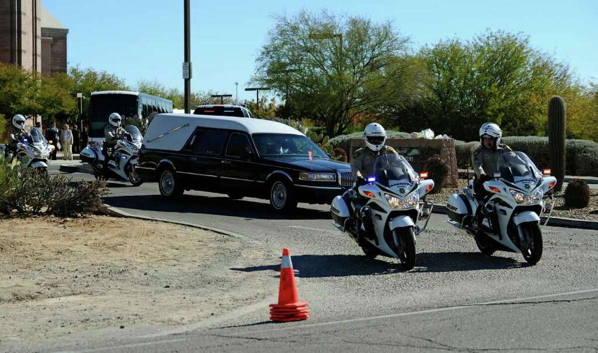 Funeral services for Ariz. shooting victim Judge John Roll