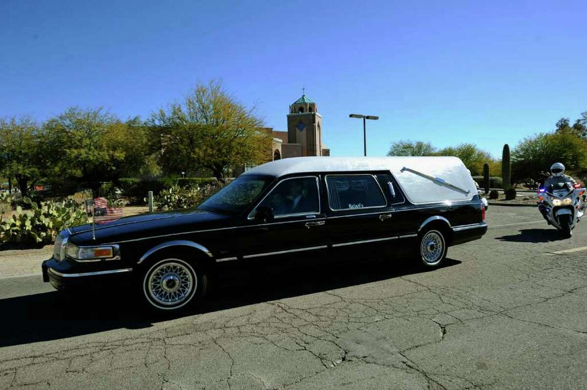 Funeral services for Ariz. shooting victim Judge John Roll