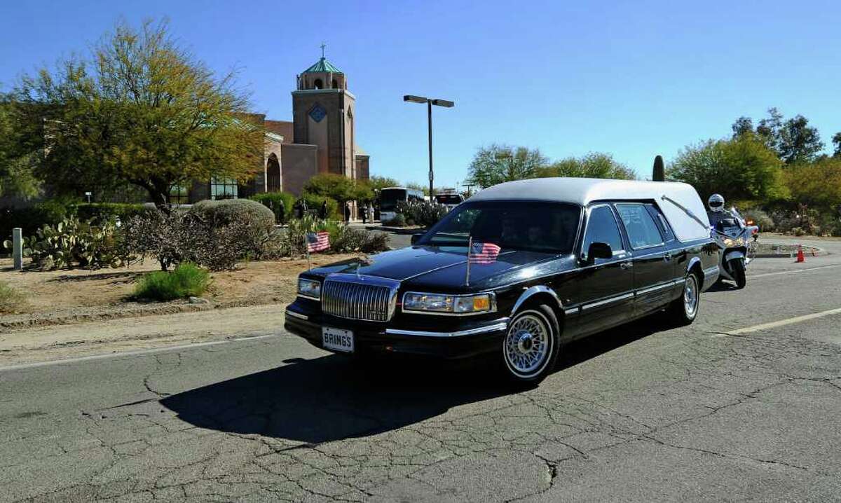 Funeral services for Ariz. shooting victim Judge John Roll