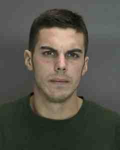 Man, 26, charged in Troy robberies