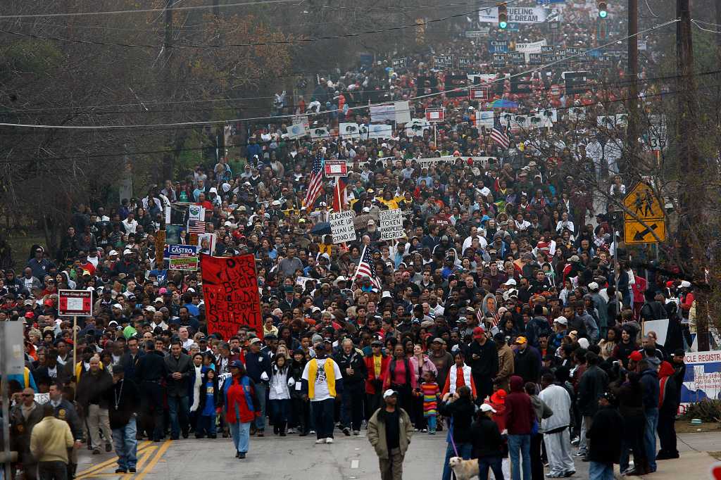 Event draws 100,000 in 24th march honoring civil rights leader