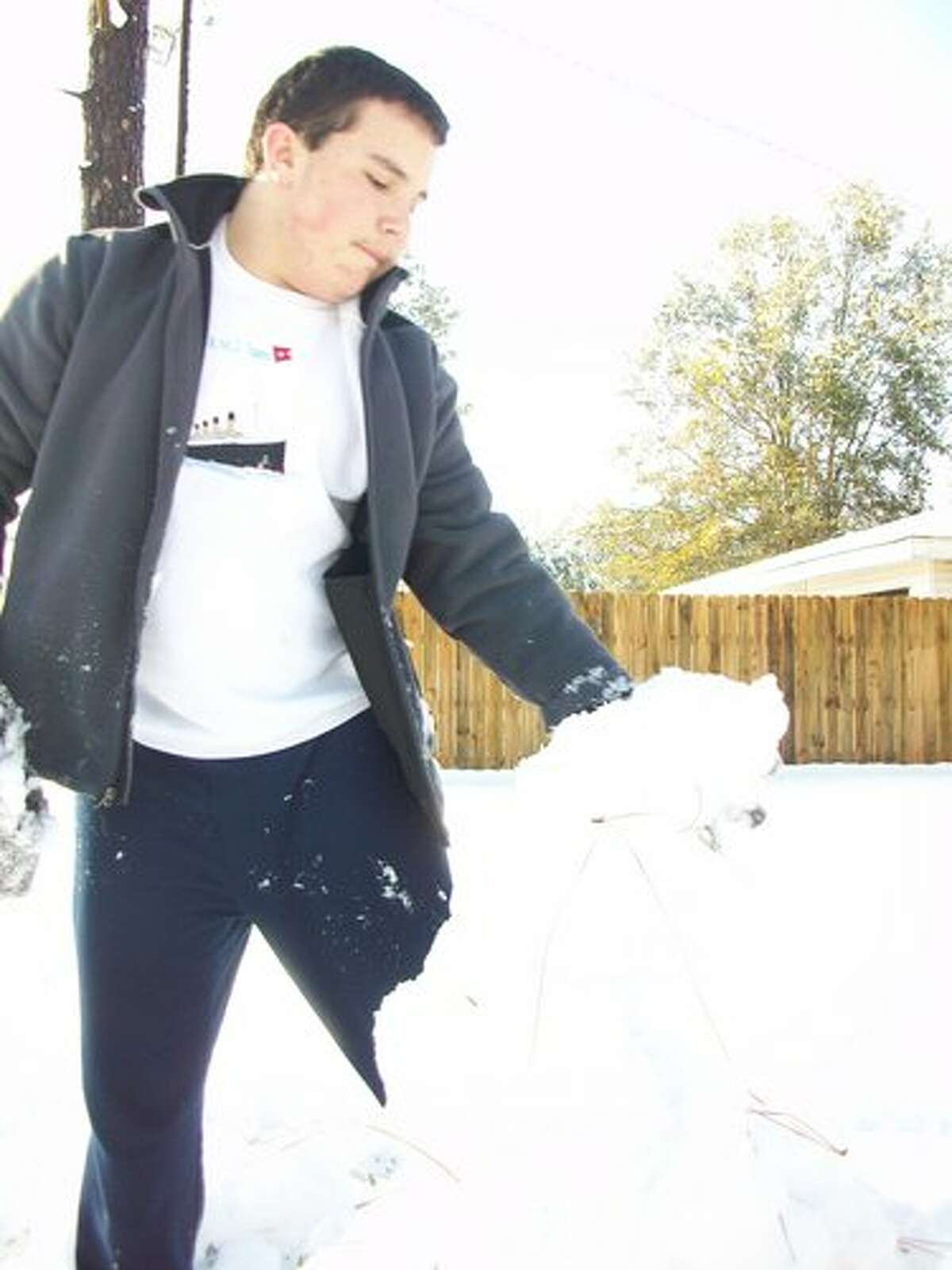 Southeast Texas enjoys, struggles with snow