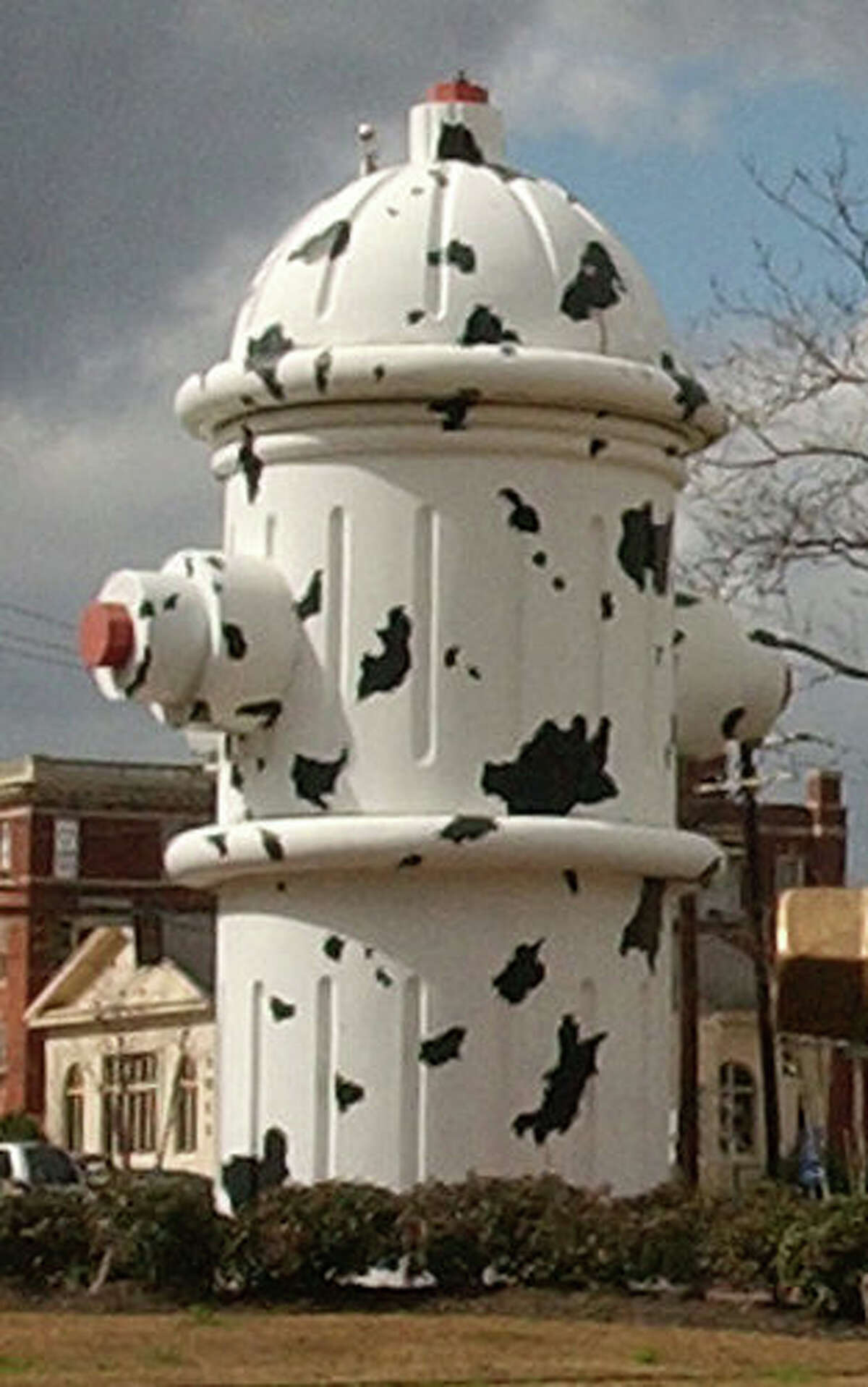 Hydrant spouts as brush scrubs