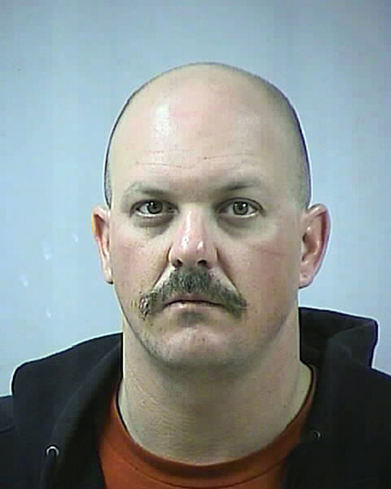 Official oppression earns ex-cop a year behind bars