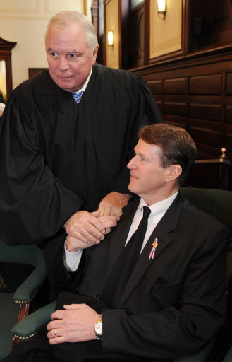 Ailing justice transfers powers