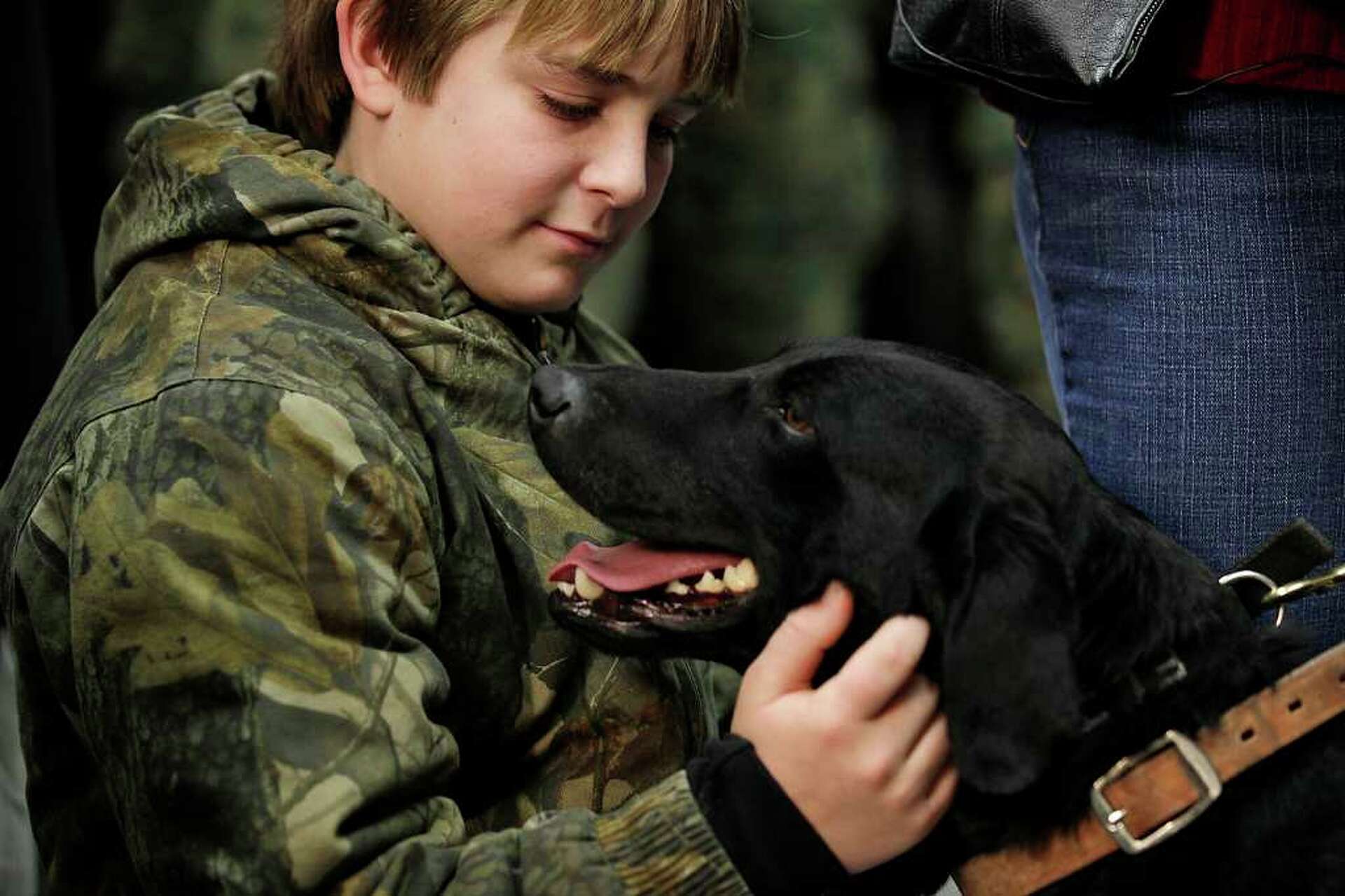 Fallen Marine's dog now is with his family
