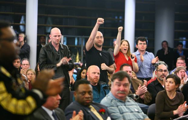Seattle police meeting draws tense, angry crowd