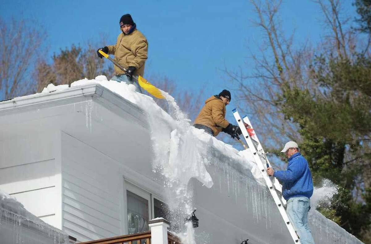 Mounting snow turns into roof hazards for homeowners
