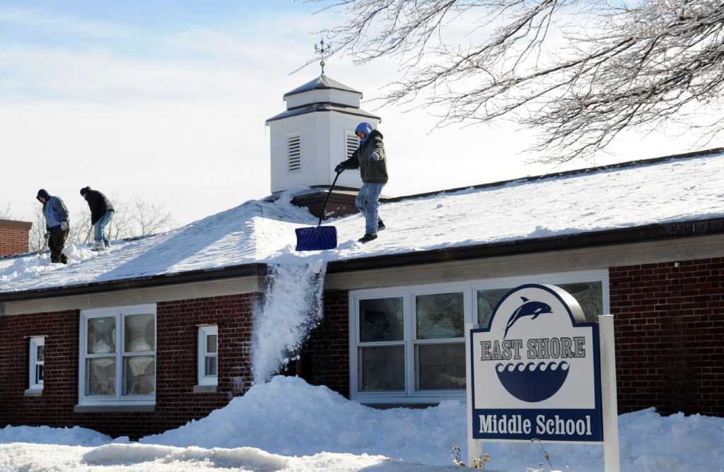 Snow on school roofs force evacuations, closures
