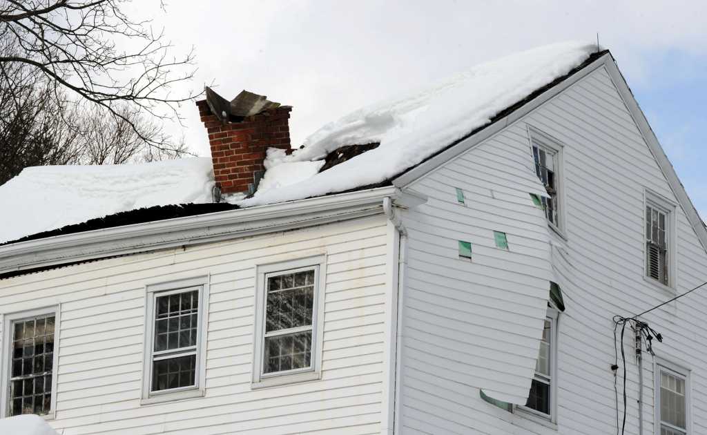 Weighted with snow and ice, two roofs in Newtown collapse; officials in ...