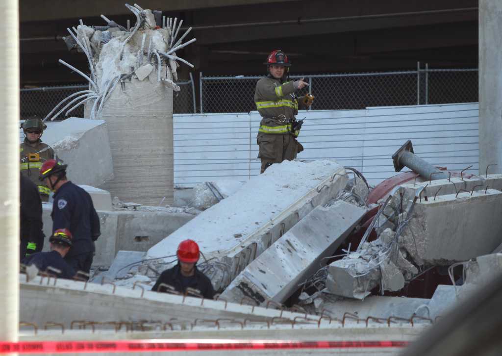 Some 120 workers got out before garage collapse, officials say
