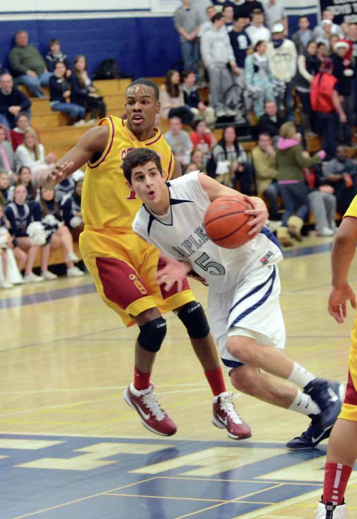 Wrecker cagers fall to tall St. Joe's