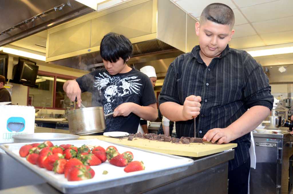 Local middle school students cook for a cause