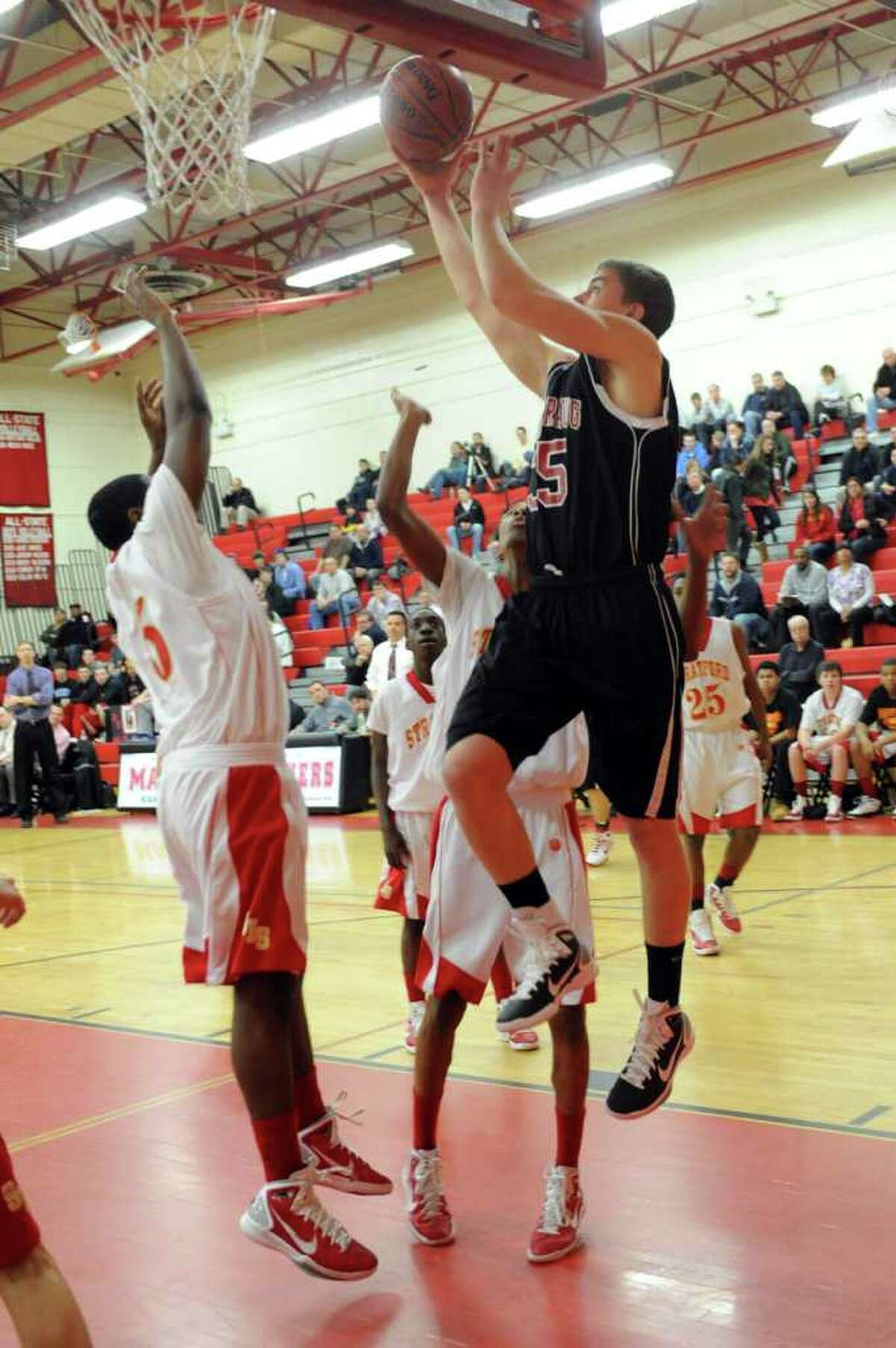 Pomperaug, Notre Dame advance to SWC boys basketball final