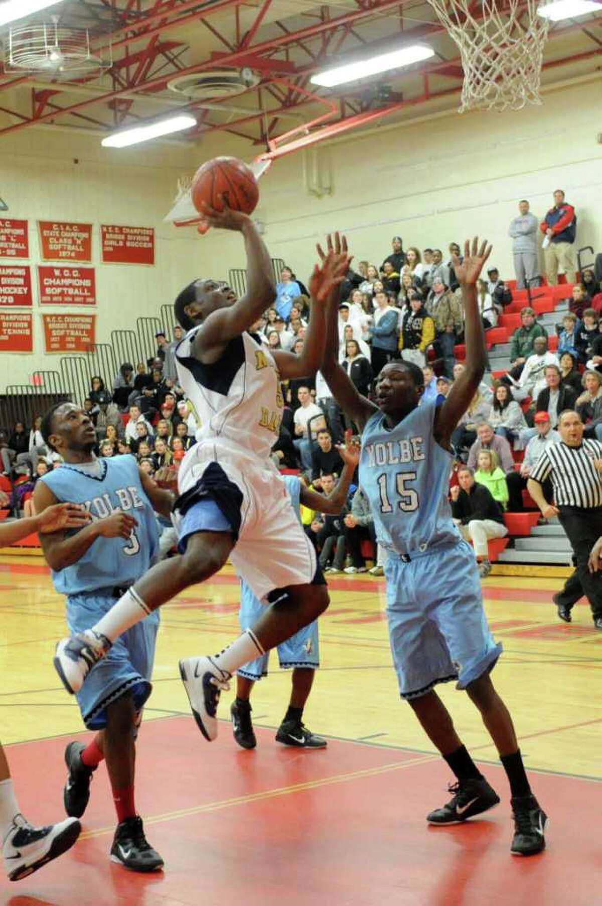 Pomperaug, Notre Dame advance to SWC boys basketball final