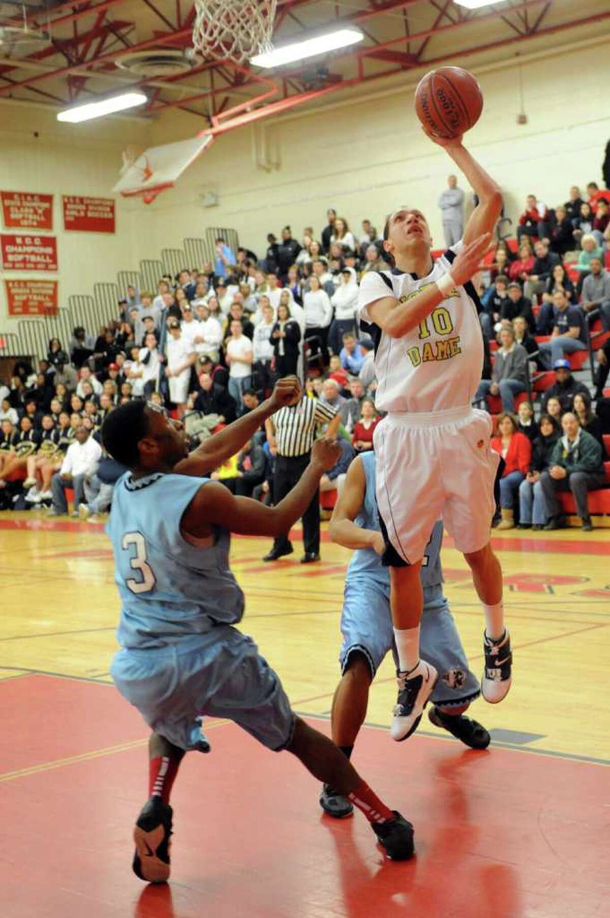 Pomperaug, Notre Dame advance to SWC boys basketball final