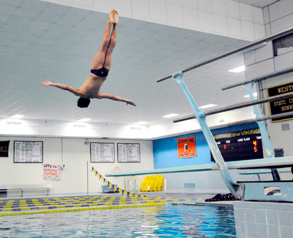 Greenwich's Brisson sets league record to win FCIAC diving title