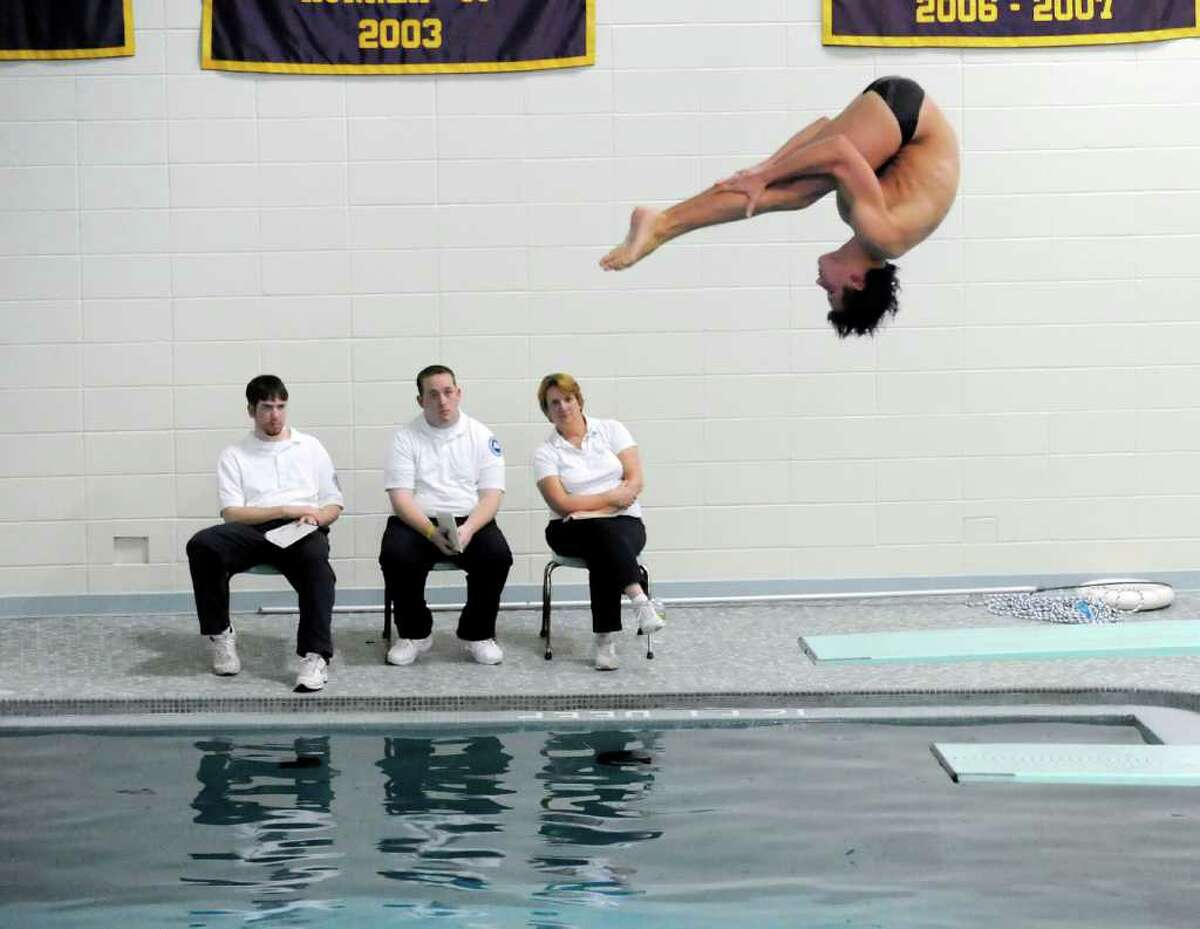 Greenwich's Brisson sets league record to win FCIAC diving title