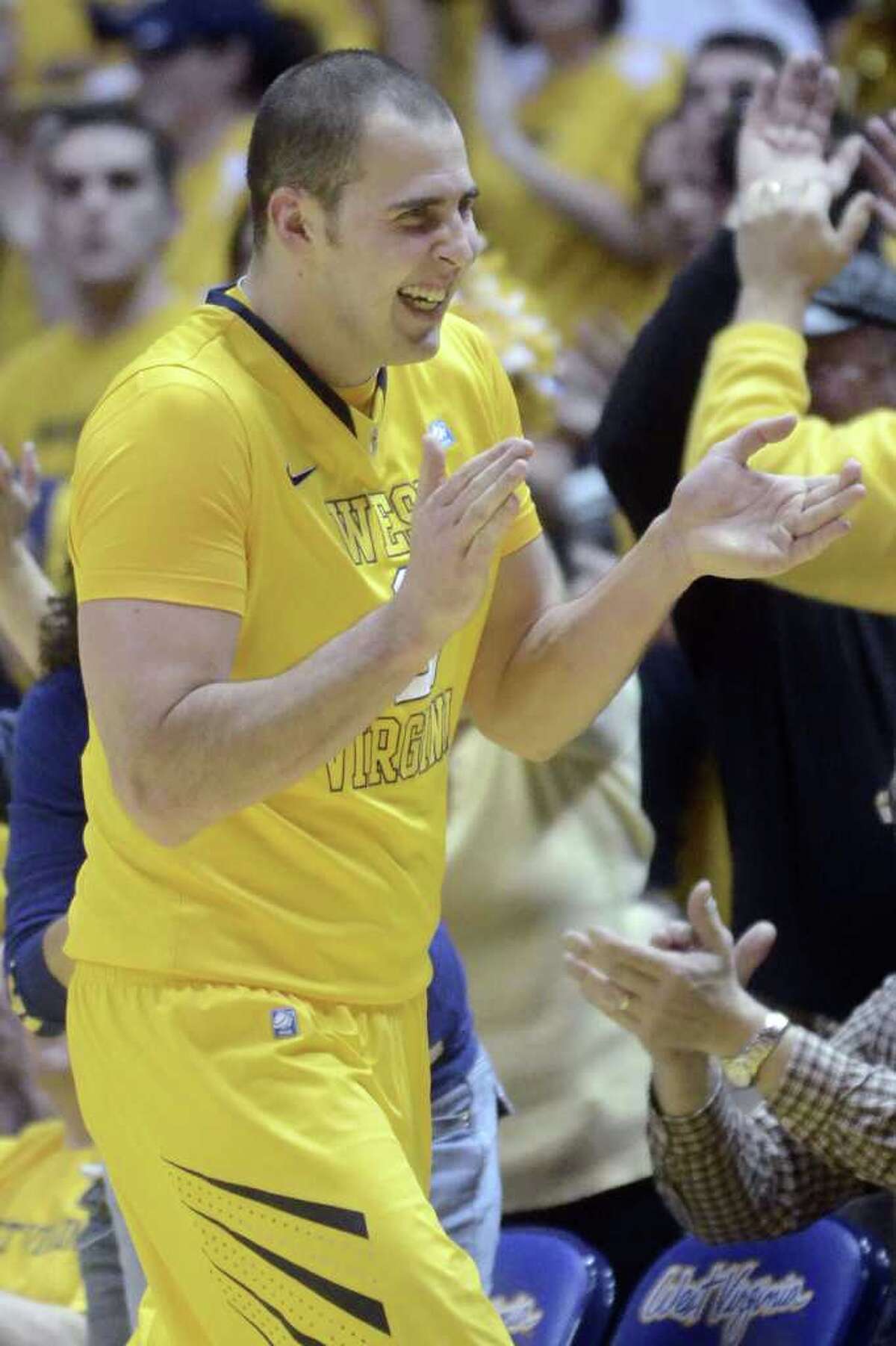 West Virginia halts UConn men