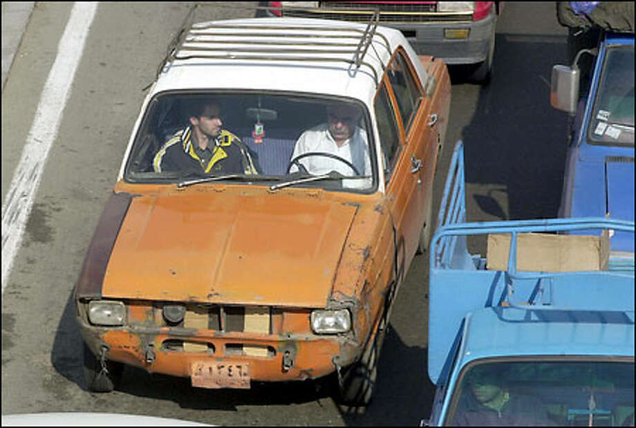 Iranians love their beat-up Paykans - seattlepi.com