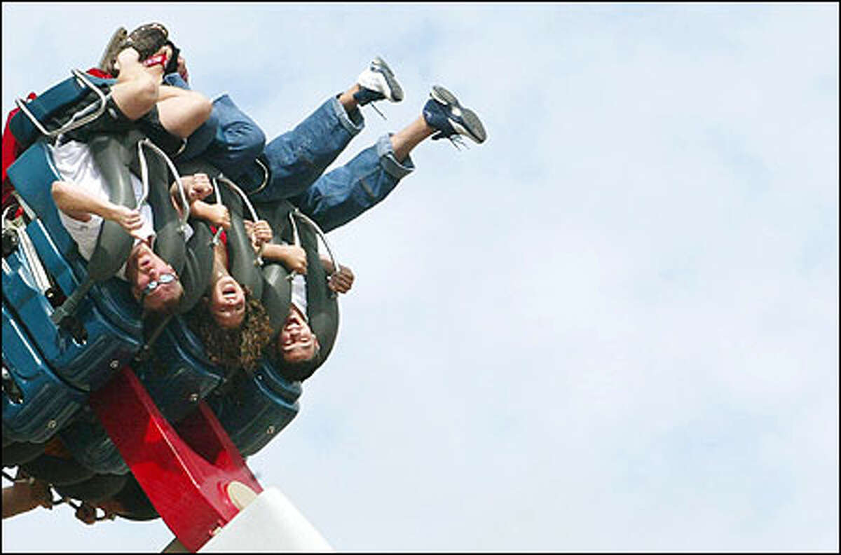 Our thrill seeker and his posse evaluate new rides at Federal Way's ...