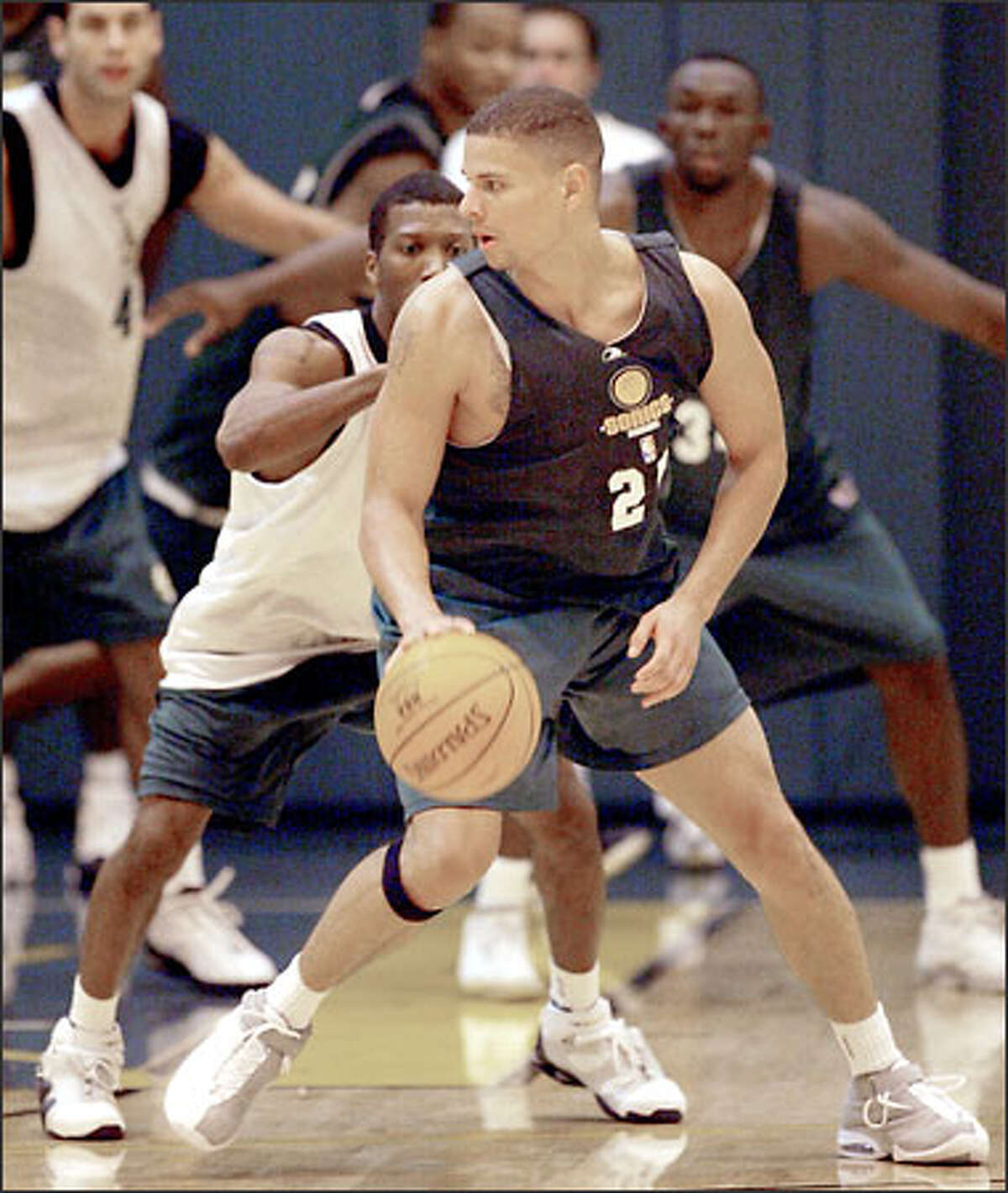 Three men share same dream chasing open spot on Sonics roster