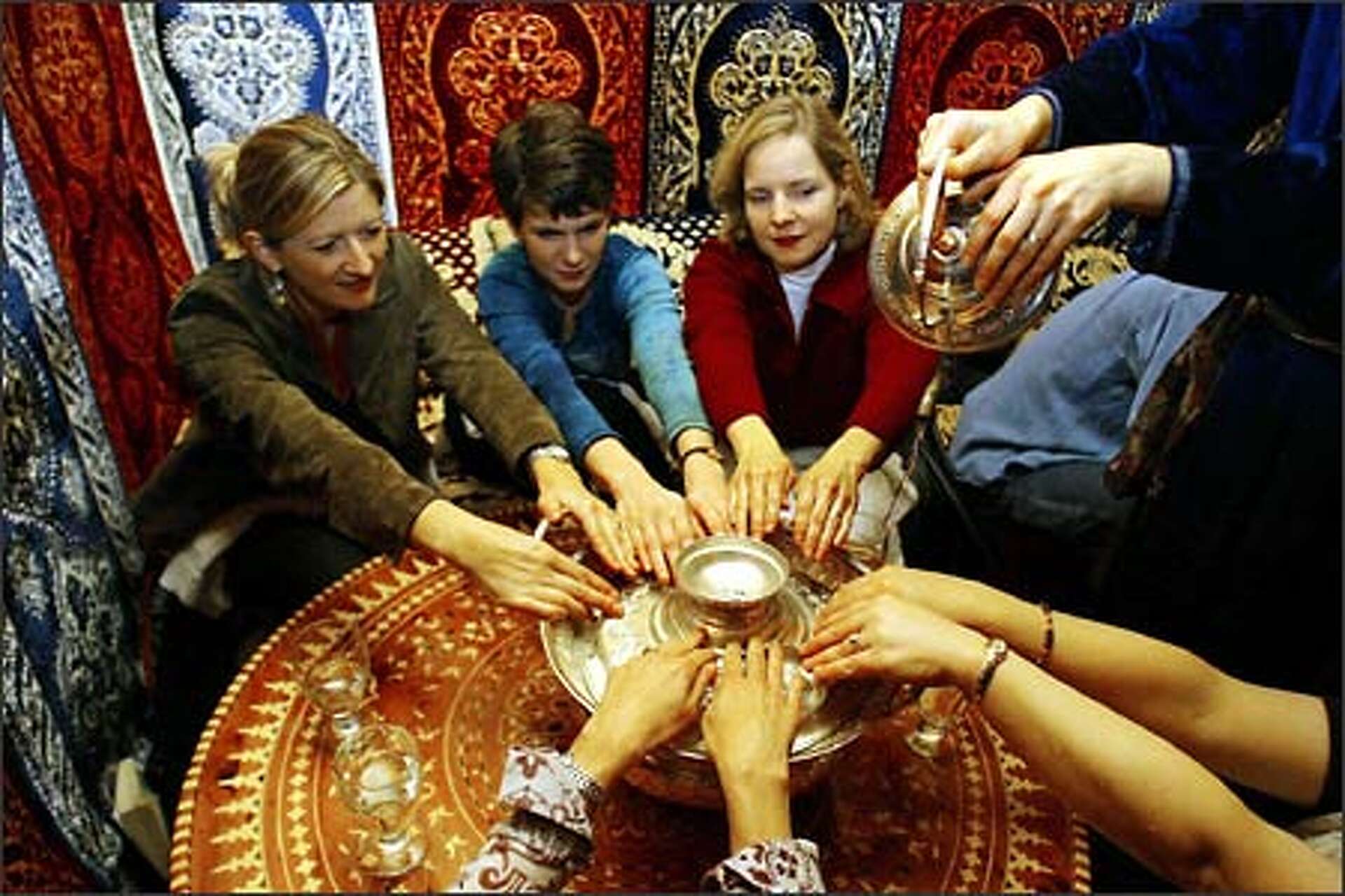 It's hand-to-mouth at Marrakesh -- and that's what makes it fun