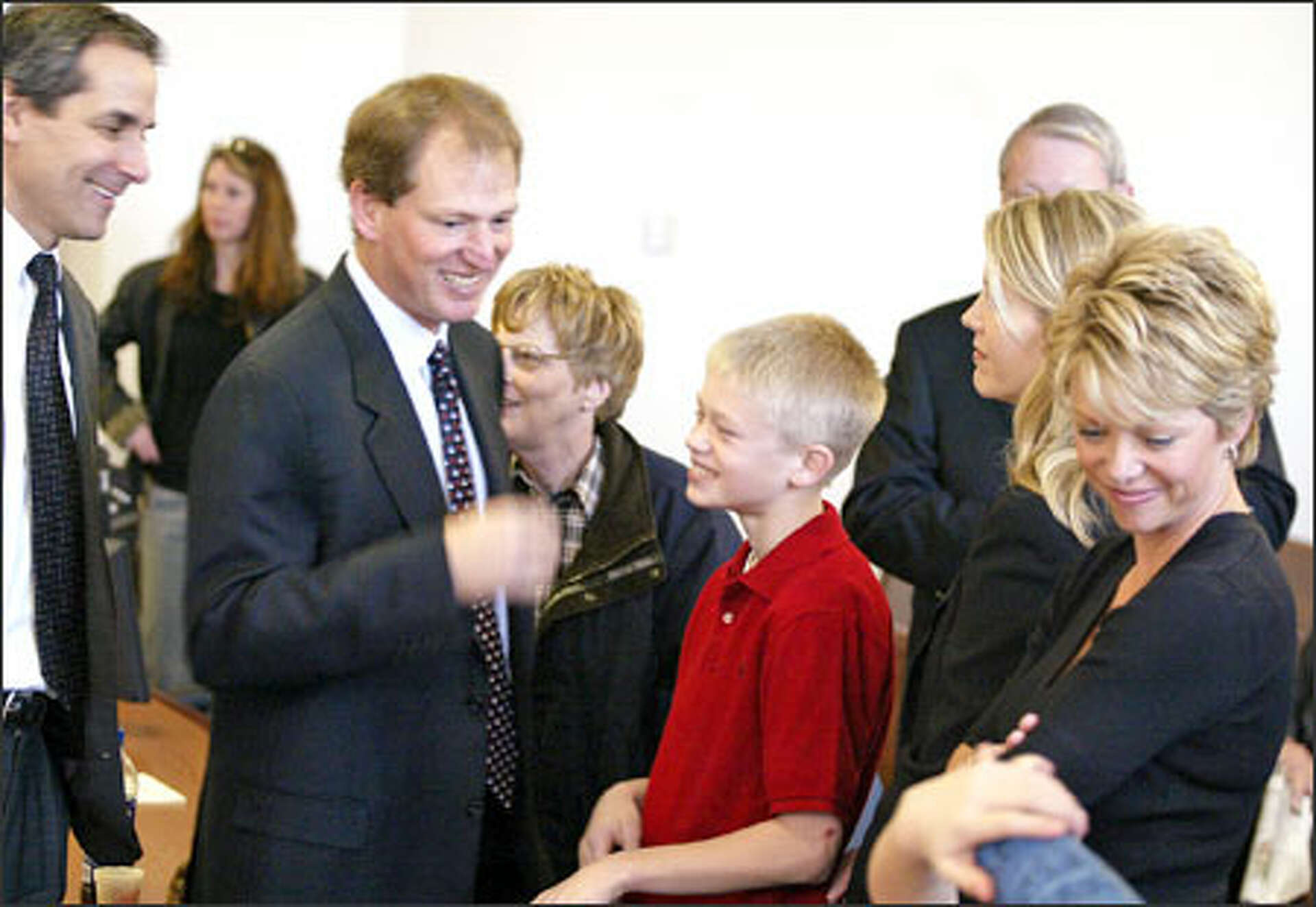 Neuheisel, UW settle