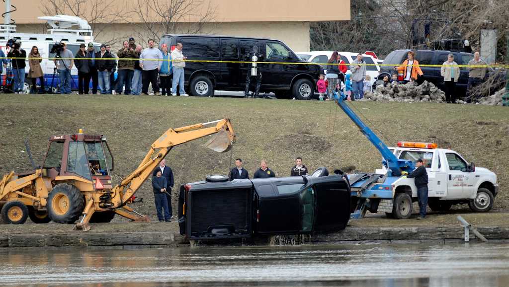 Police pull truck from Hudson