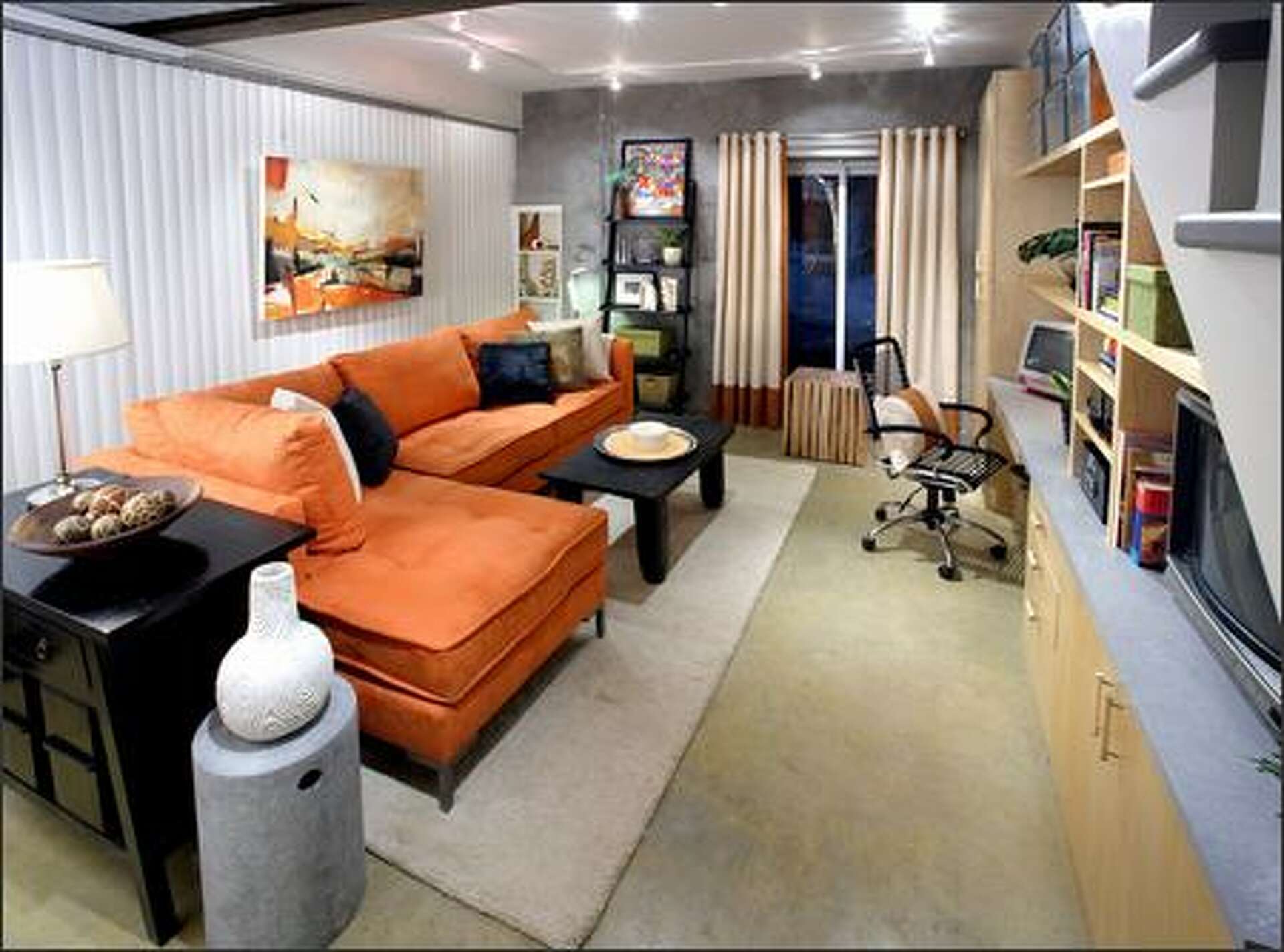 Divine Design: Sliding panels help lift up a dingy basement