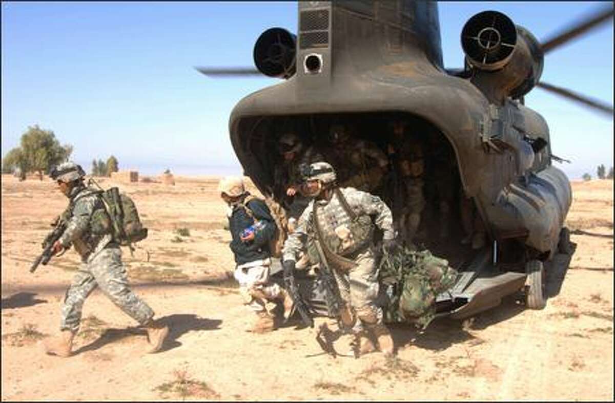 U.S. swarms insurgent zone, captures 41