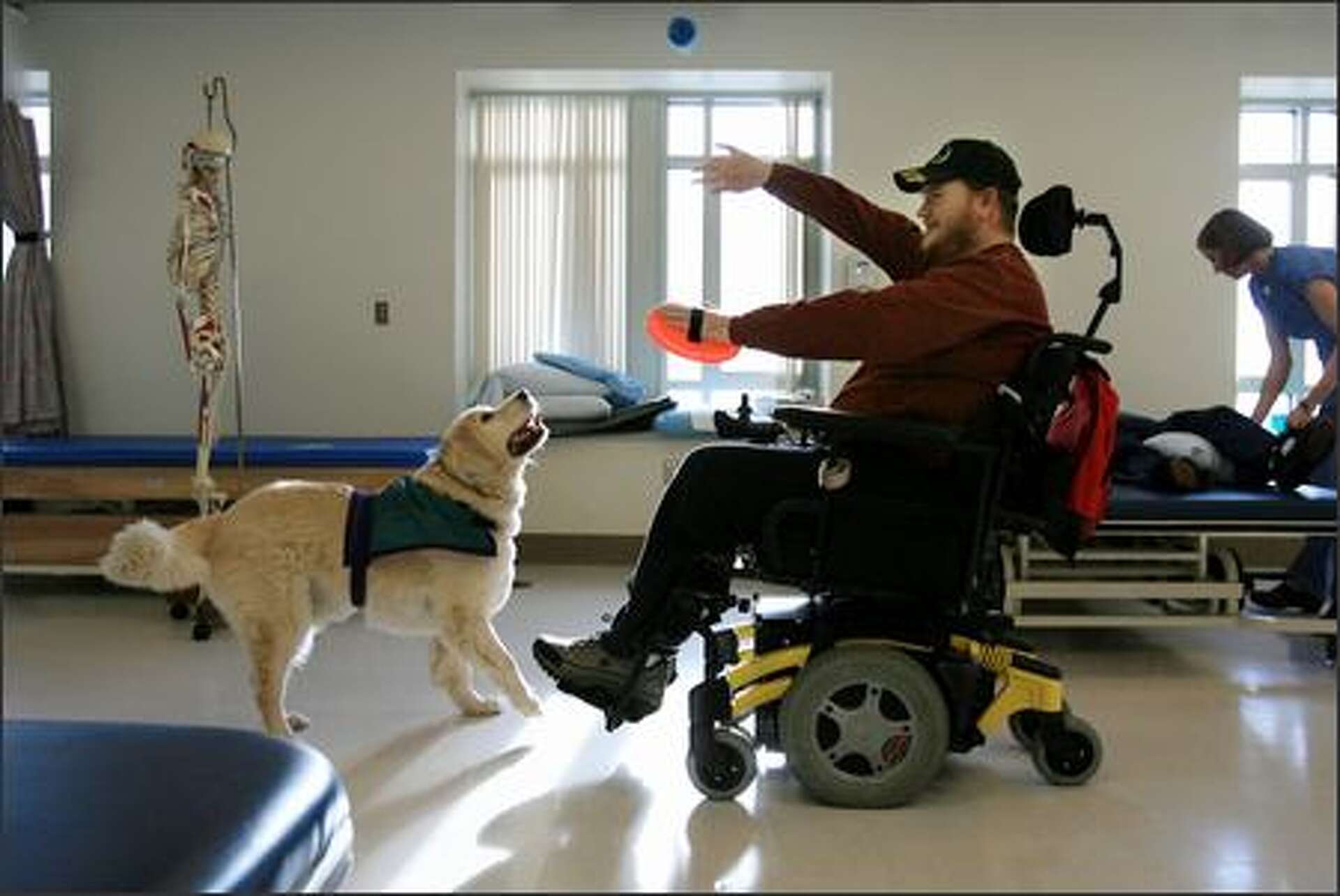 Pets make hospital rounds, bring 'therapeutic touch' to patients