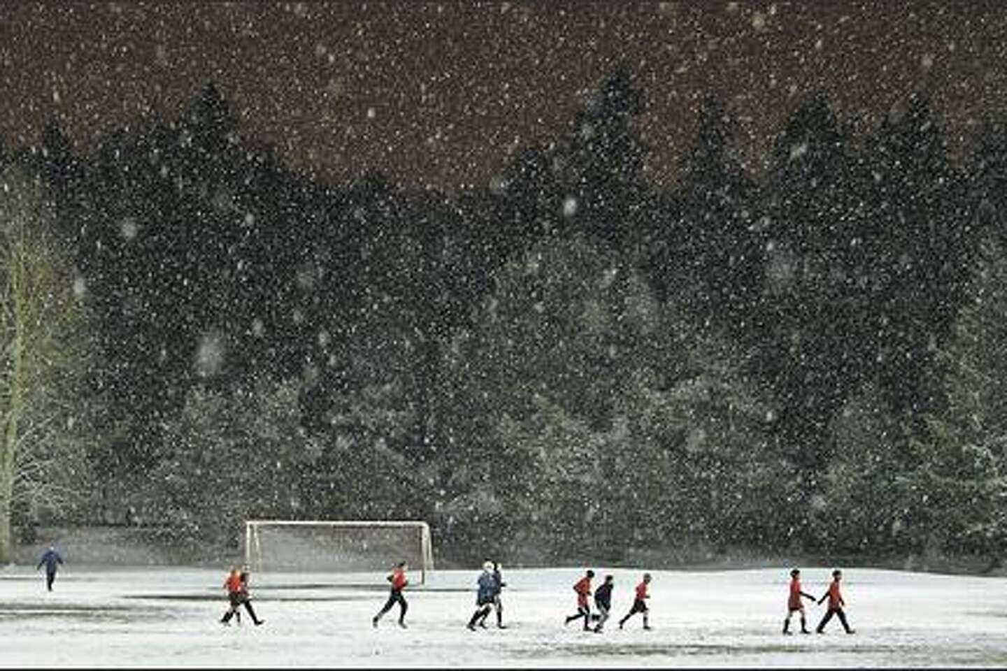 Nightmare for drivers: Snow, commute and a Seahawks game