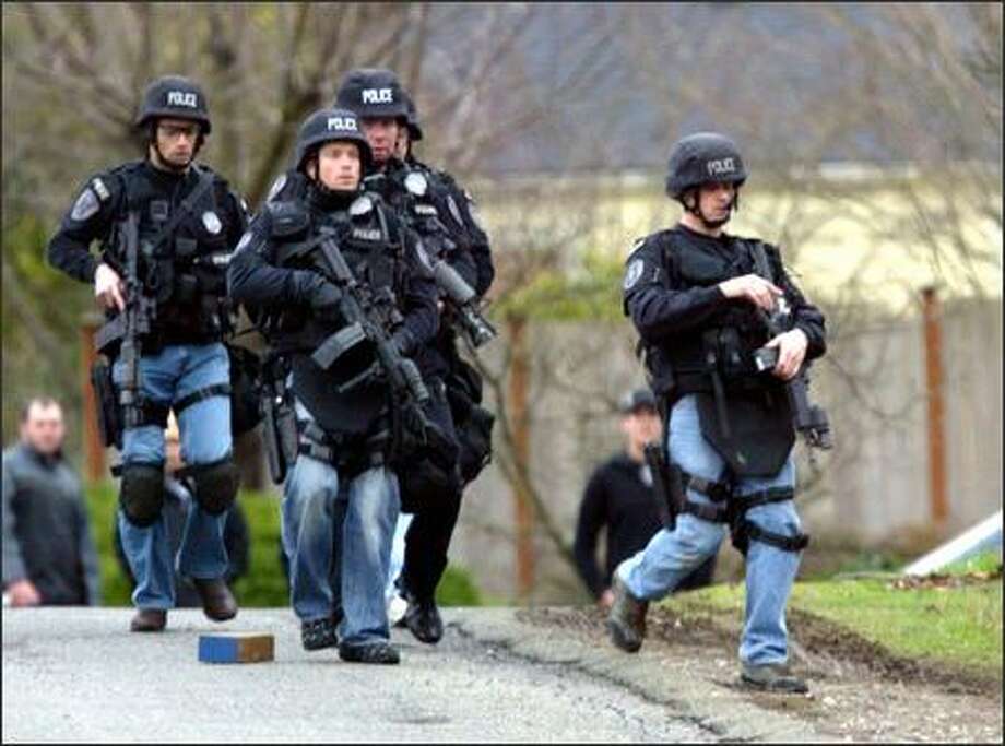 4 detained, at least 1 arrested after standoff ends - seattlepi.com