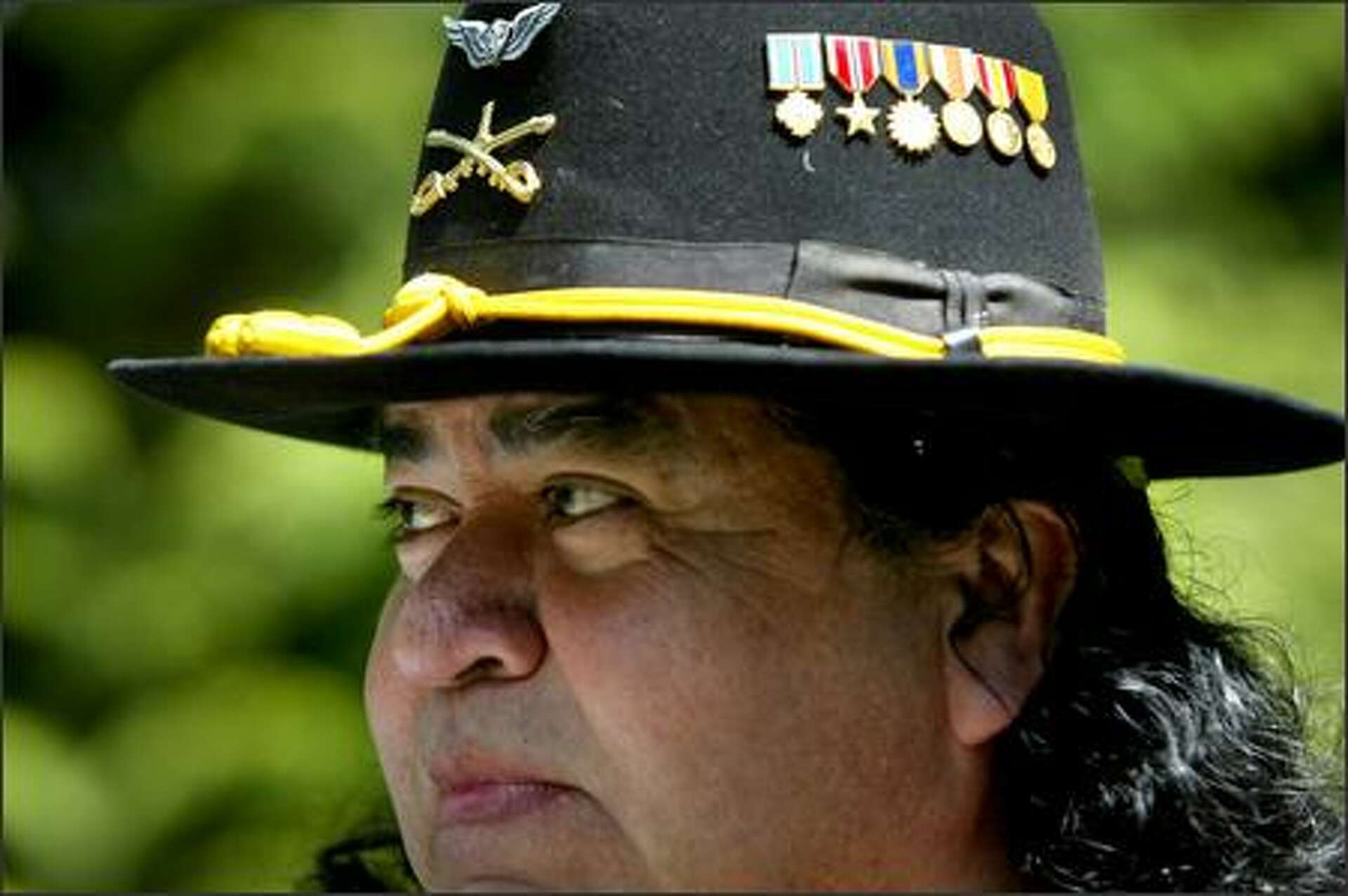 Native American color guard salutes all fallen veterans