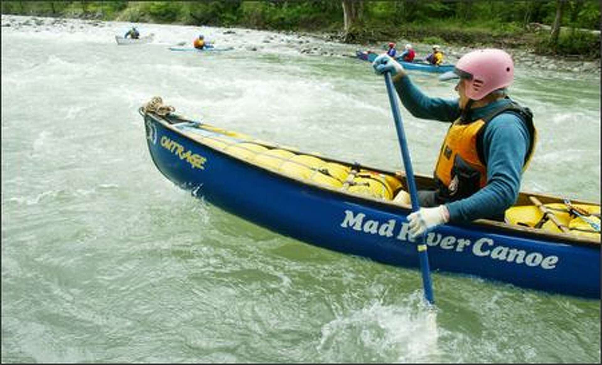 The river is wet and wild, yet safety is canoe club's No. 1 priority