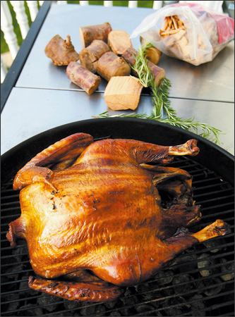 Cooking a holiday turkey over fire is the way to go