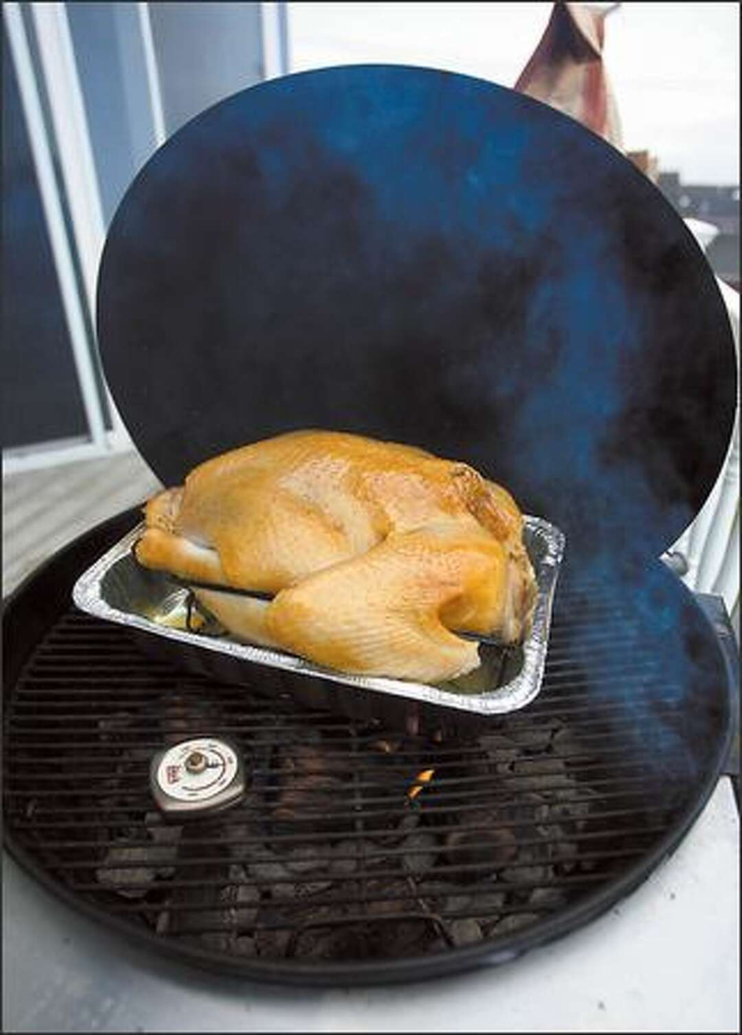 Cooking a holiday turkey over fire is the way to go