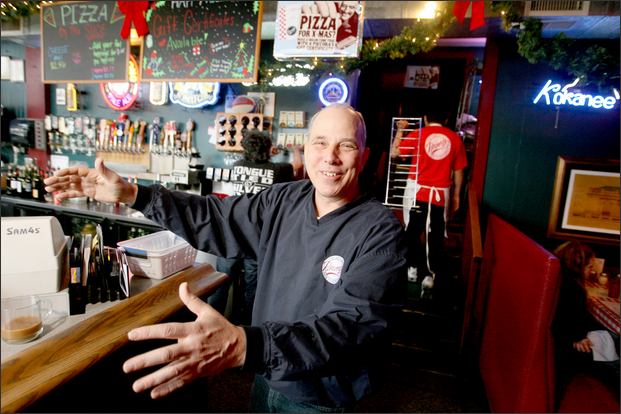Piecora seasons pizza with humor