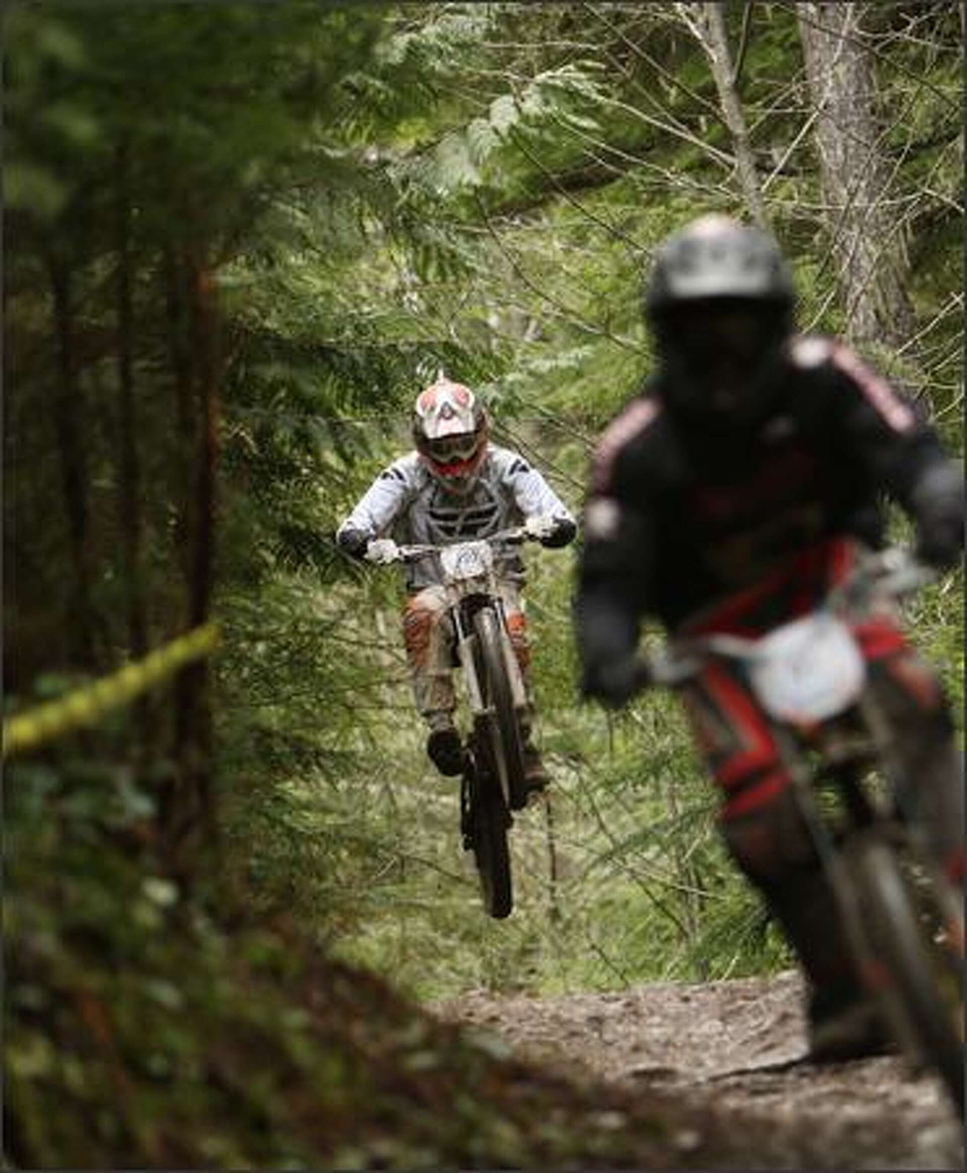 Downhill mountain bike racing is a thrill-packed, muddy experience