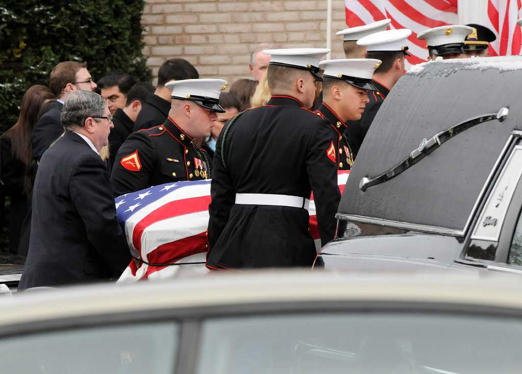 Mourners pay respects to fallen Marine