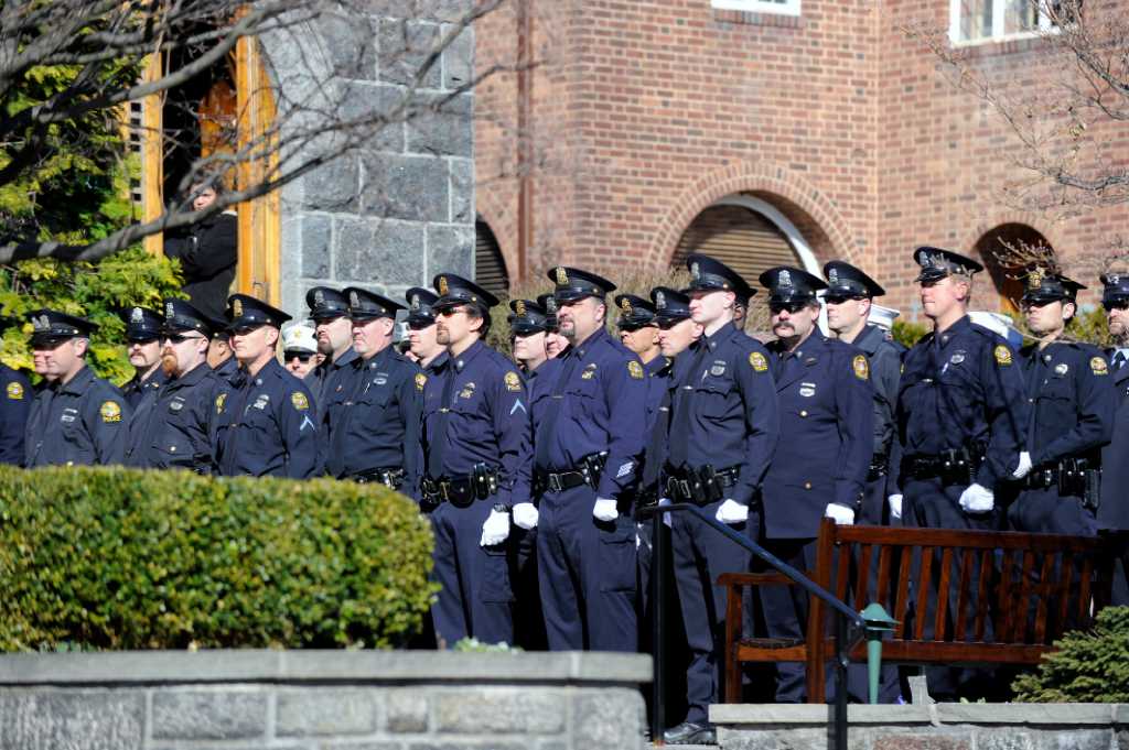 Blue wall of cops past and present pays tribute to fallen officer