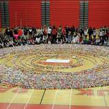 Masuk students construct record-breaking pi paper chain - Connecticut Post